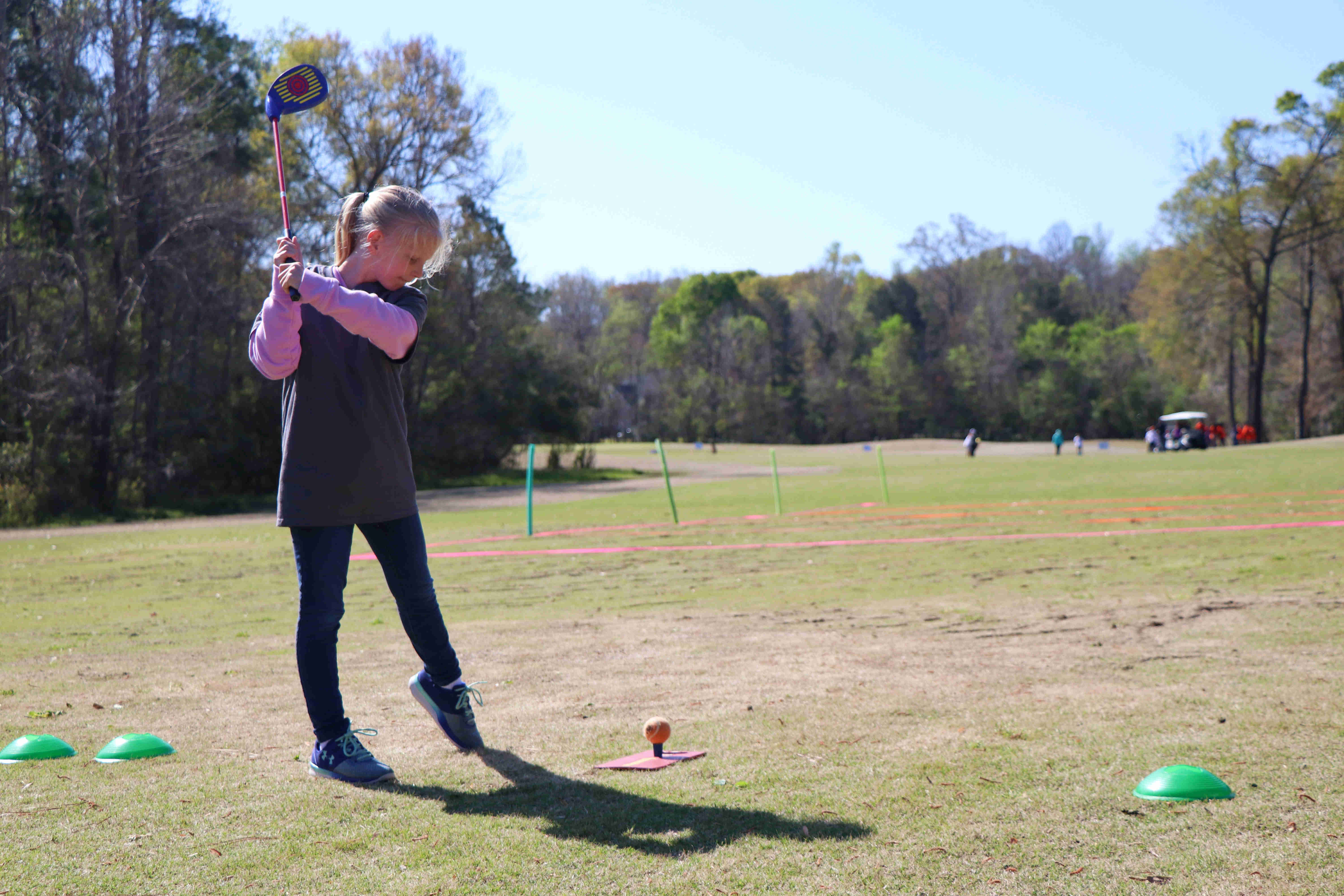 Long Drive Backswing Girl - First Tee - Greater Charleston